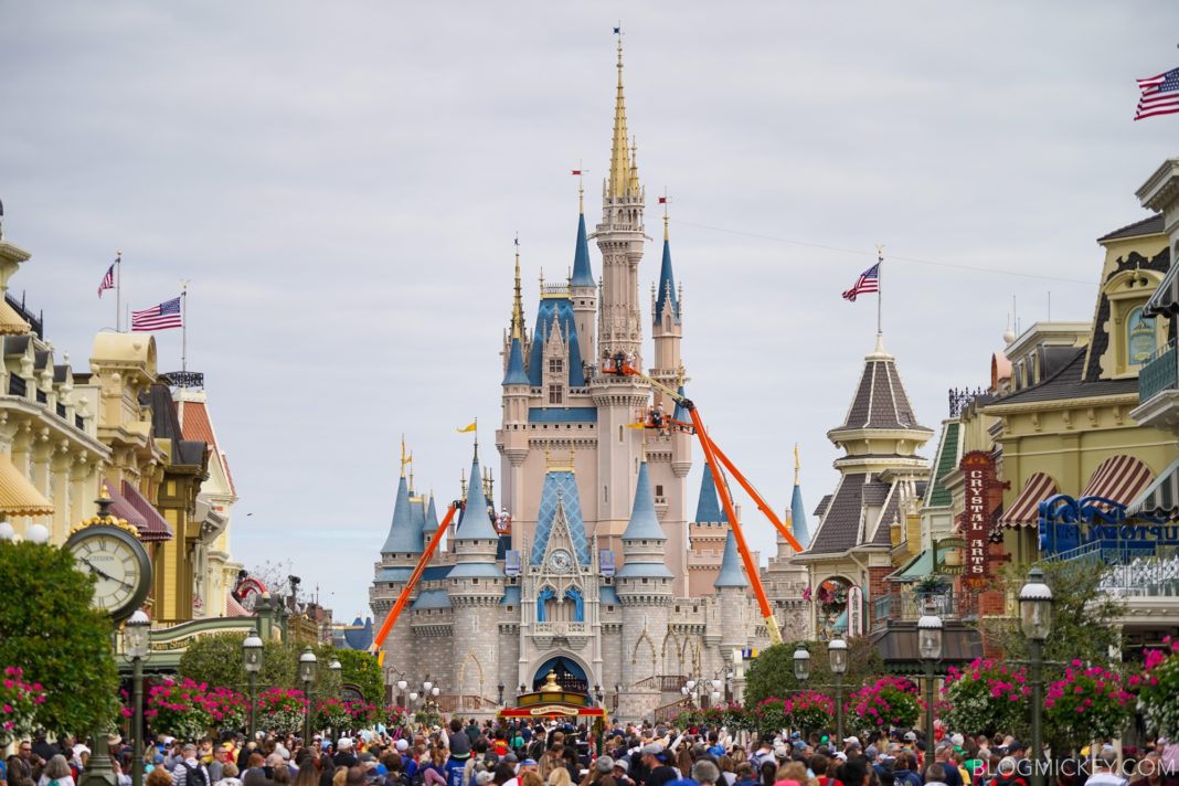Painting Begins to Turn Cinderella Castle Rose Pink at Magic Kingdom
