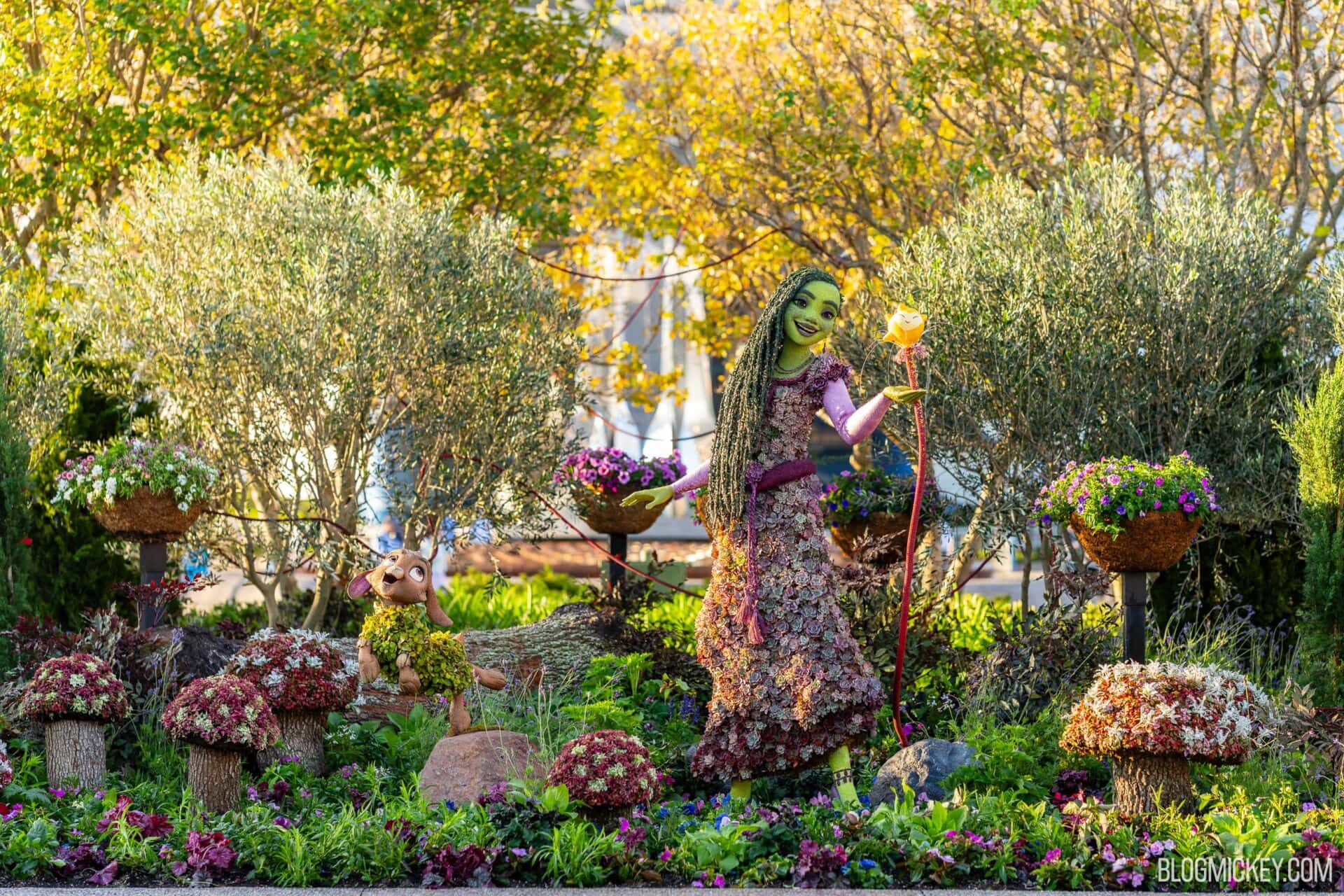 Wish Movie Topiary Debuts at EPCOT Main Entrance for 2024 Flower ...