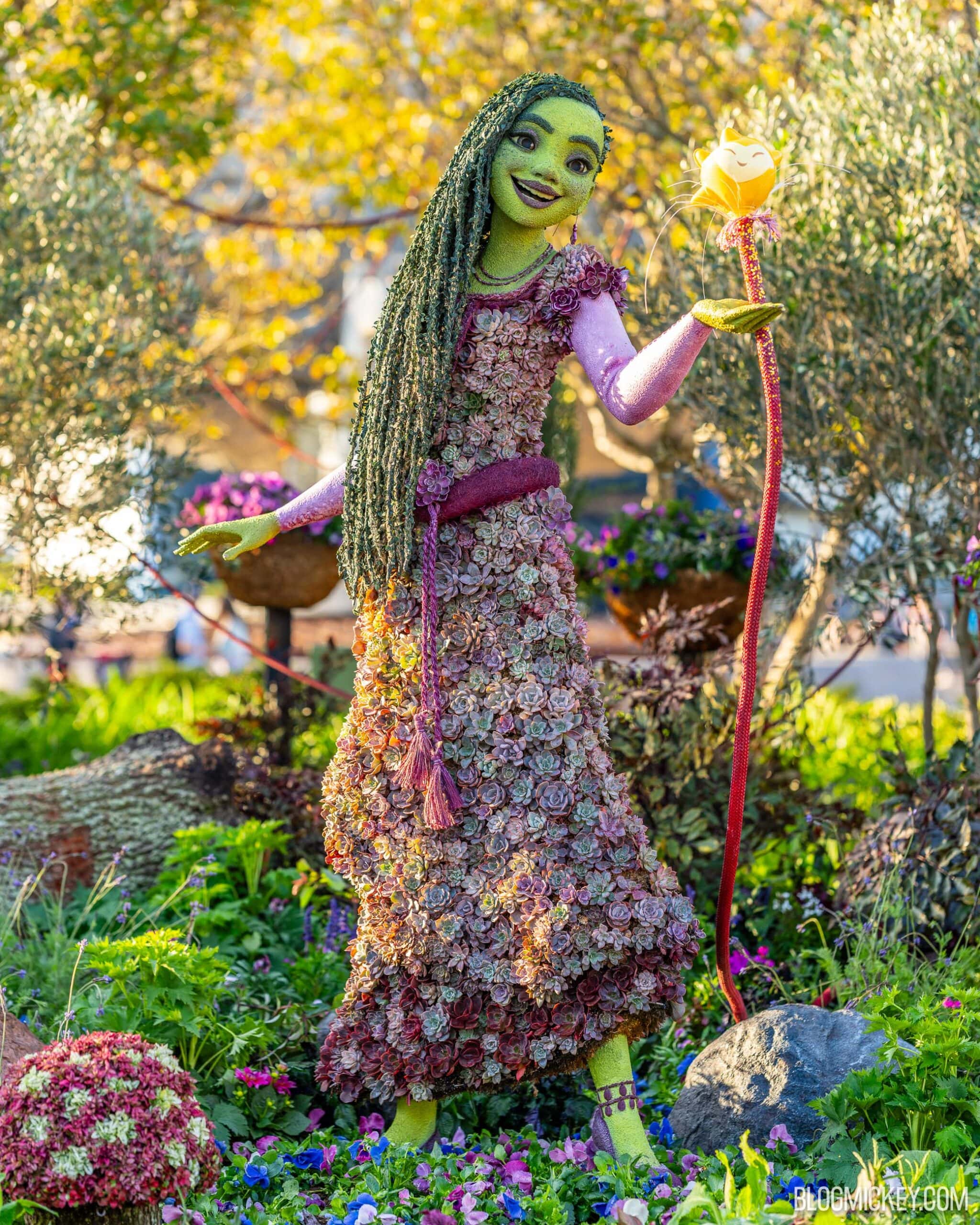 Wish Movie Topiary Debuts at EPCOT Main Entrance for 2024 Flower ...