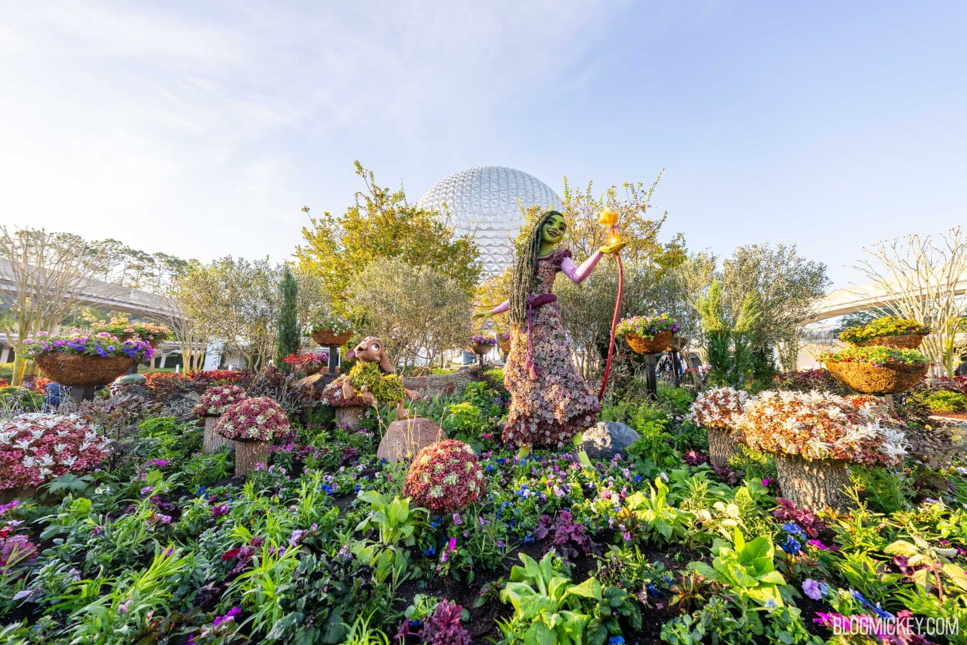 Wish Movie Topiary Debuts at EPCOT Main Entrance for 2024 Flower ...